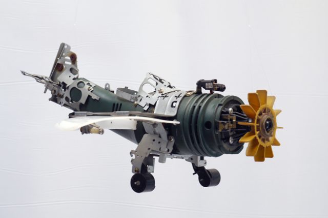 Mustard Plane - Hubcap Creatures